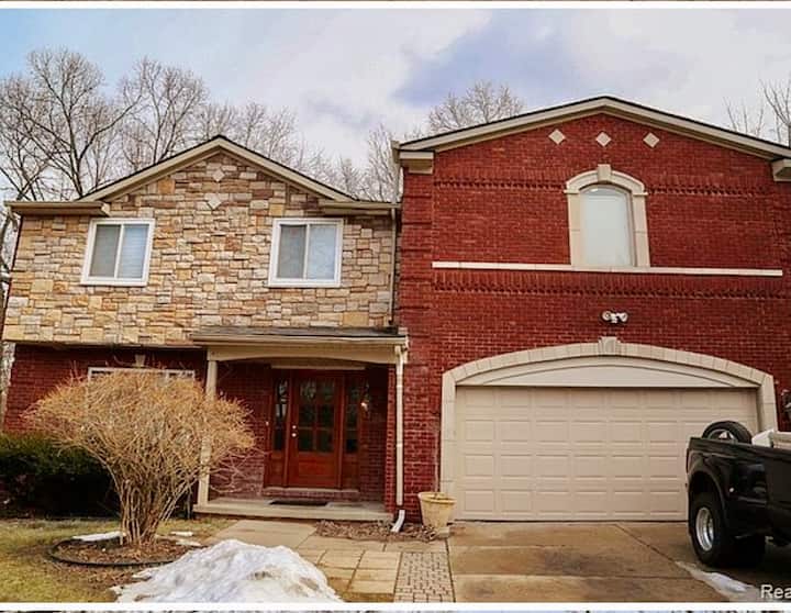 Fireplace With 86 Inch Tv And Jacuzzi Tub - Auburn Hills, MI