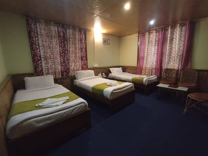 Warm Cozy Rooms With Bamboo Themed Interiors - Ravangla