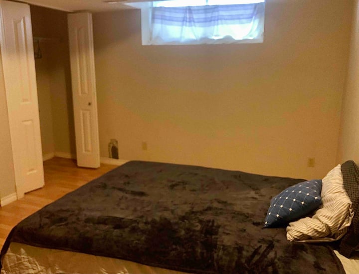 Cozy Bedroom With Queen Sized Bed In Chestermere - Chestermere