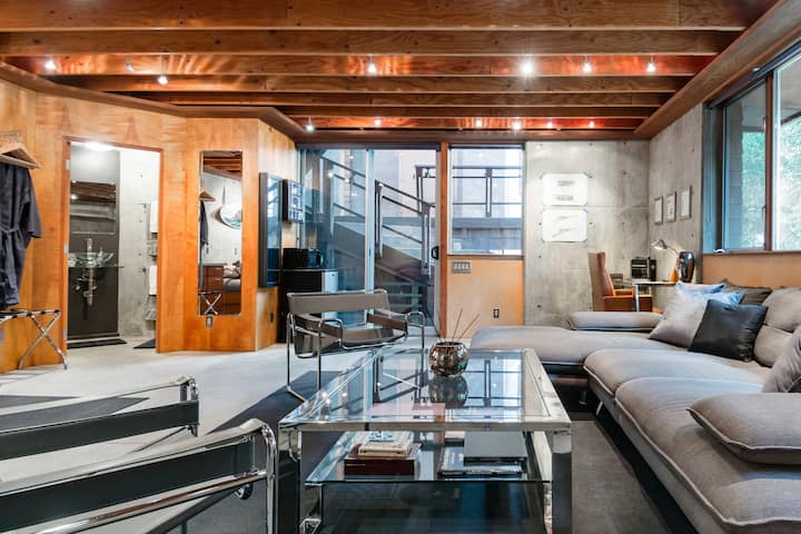 Overlook The Distant Rolling Hills At An Industrial Home - California