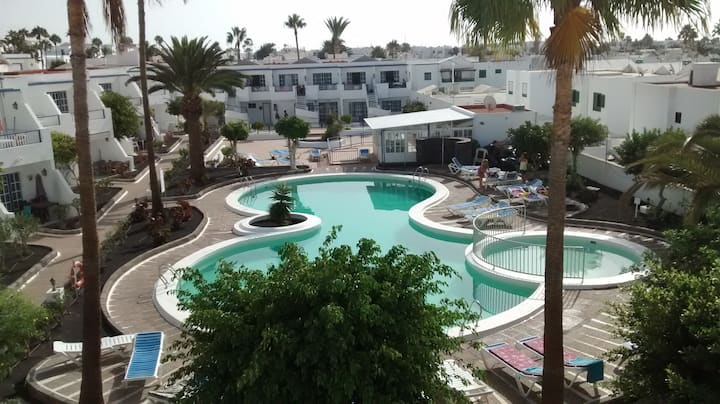 An Apartment With An Ocean View And A Pool - Puerto del Carmen