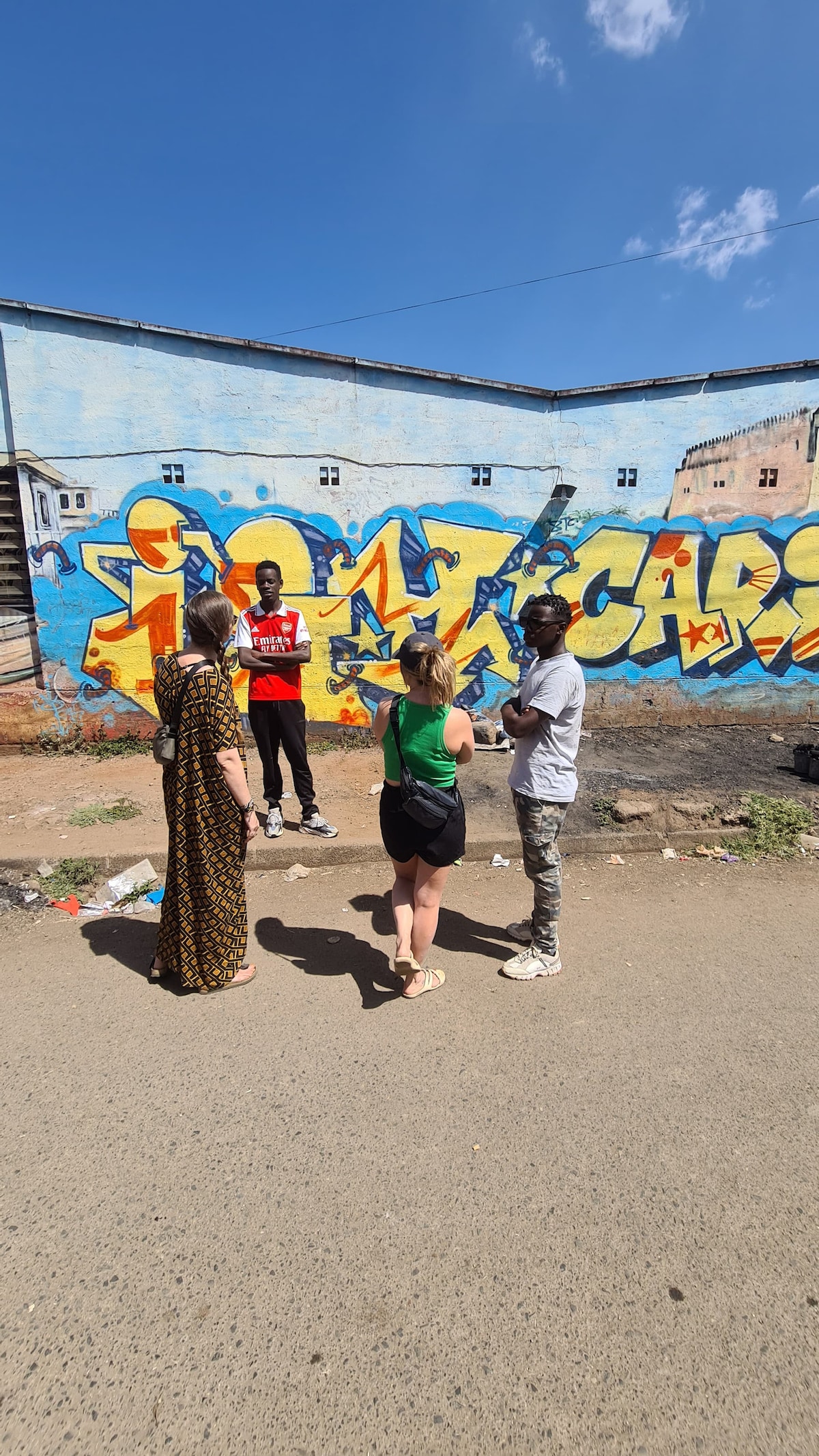Admire Kibera's street art with local artists · ★4.97