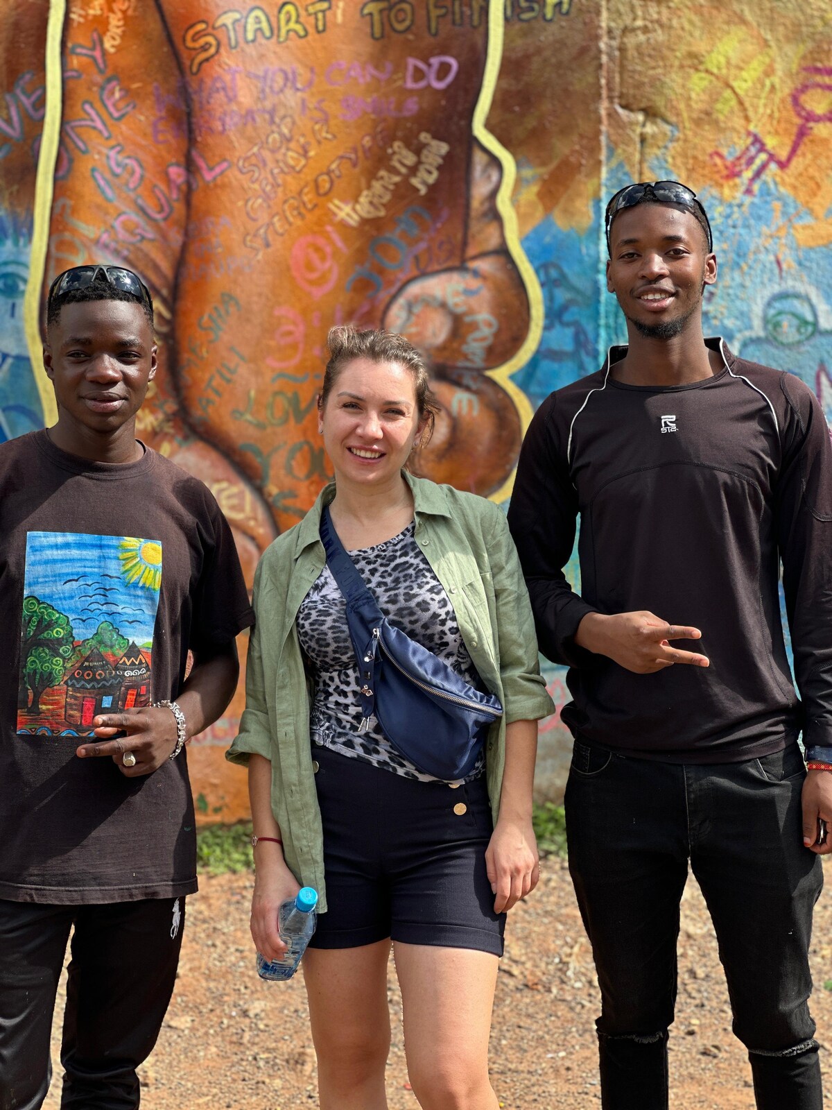 Admire Kibera's street art with local artists · ★4.97
