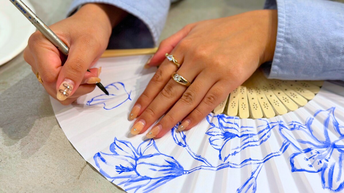 Japanese Fan Painting in a Tokyo Flower Shop