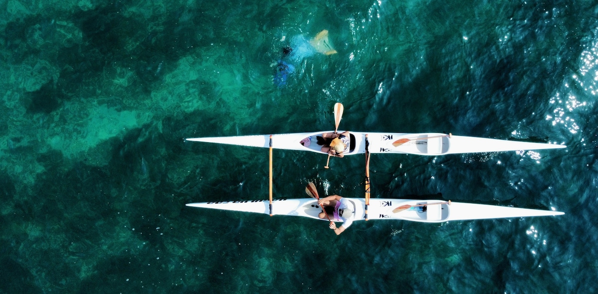 Bioluminescent Night Paddle in a Polynesian Canoe