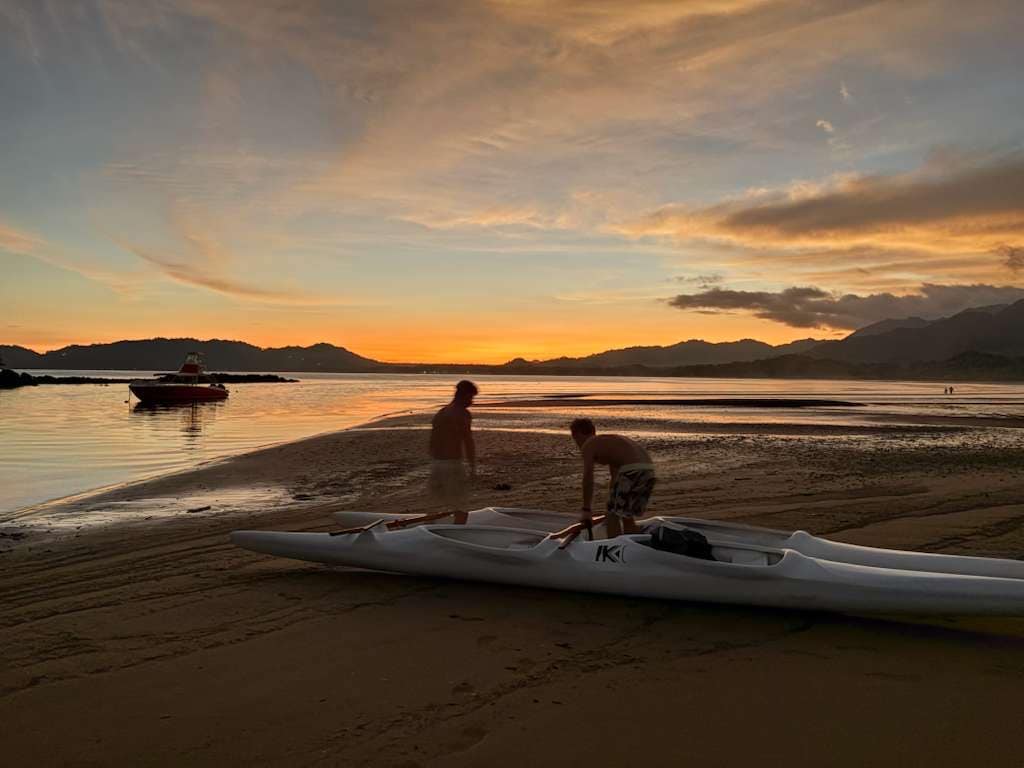 Bioluminescent Night Paddle in a Polynesian Canoe