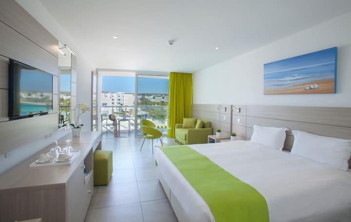 Junior Suite • Sea View • Private Balcony Sleeps 4 - Protaras