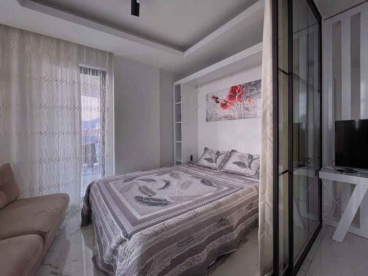 Элитная с двумя кроватями + диван в центре Алании - Alanya