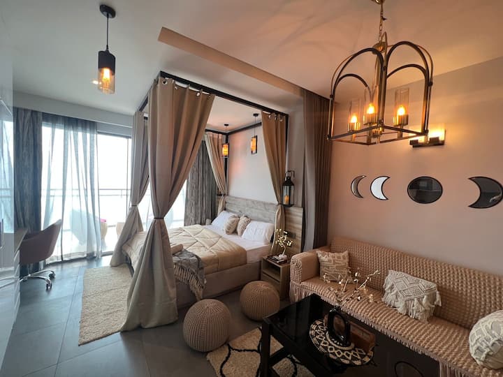 Boholuxe | River Facing Themed Suite - Noida