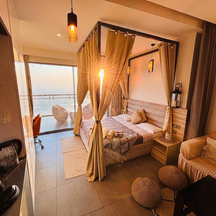 Boholuxe | River Facing Themed Suite - Noida