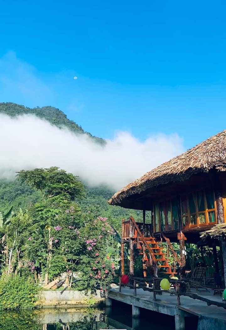 A Wooden House By The River With Mountain View - Vietnam