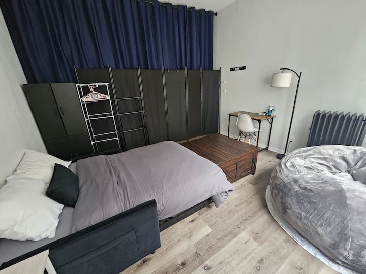Private Living Room With A Divider And Sofa Bed. - Chicago, IL