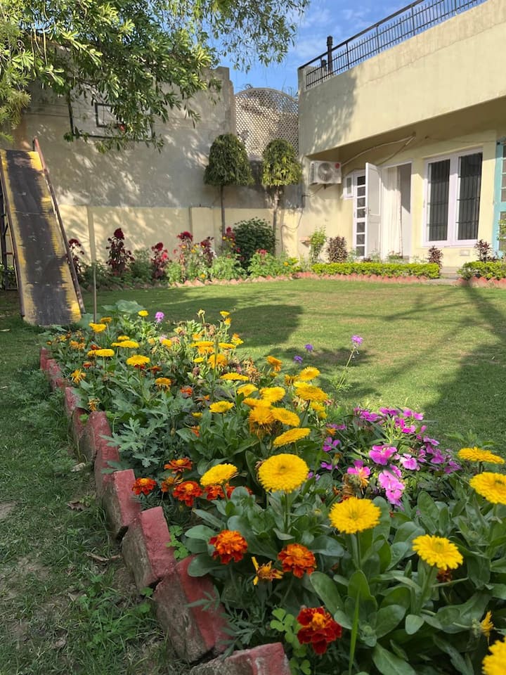 Cozy Room Opening Into Serene Garden - Amritsar