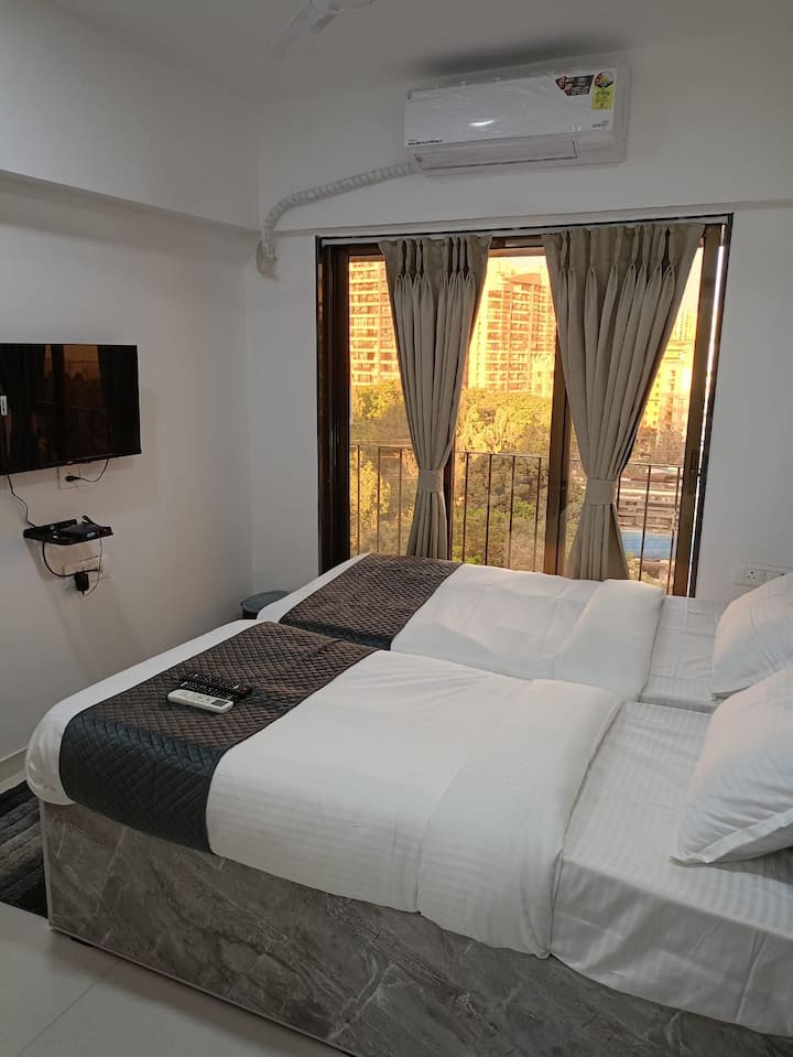 Astha Home -Contemporary 2bhk Near Boomerang - Mumbai