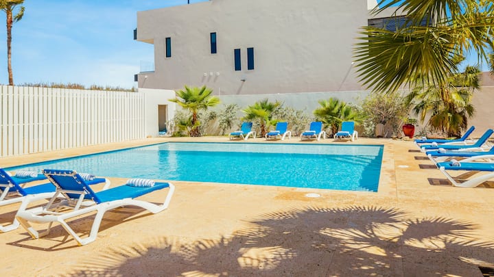 Seafront Villa |  Blue Door Beach House By Bocobay - Aruba