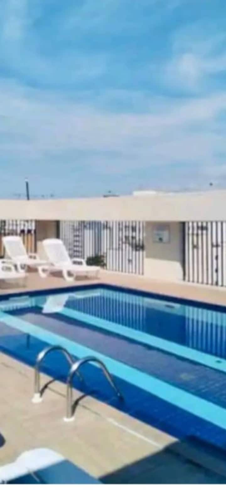 Flat/garagem/piscina/300mts Praia/ Shop. Brisamar - Sao Vicente, Brazil