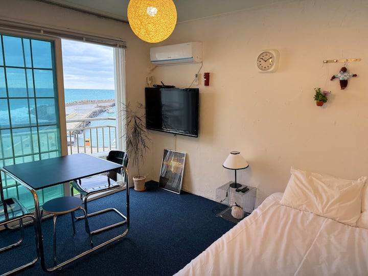 오픈특가303호/바로앞바다오션뷰/자전거캠핑의자대여/공항10분 - Jeju