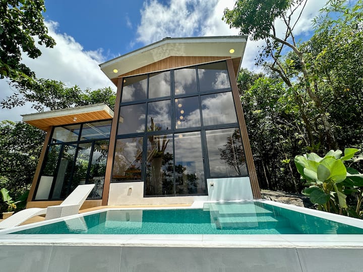 Overlooking Foresta Glasshouse - Paete