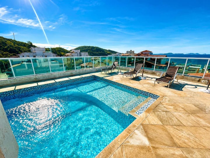 Prainha Paradise: Ocean Views & Rooftop Pool - Arraial do Cabo