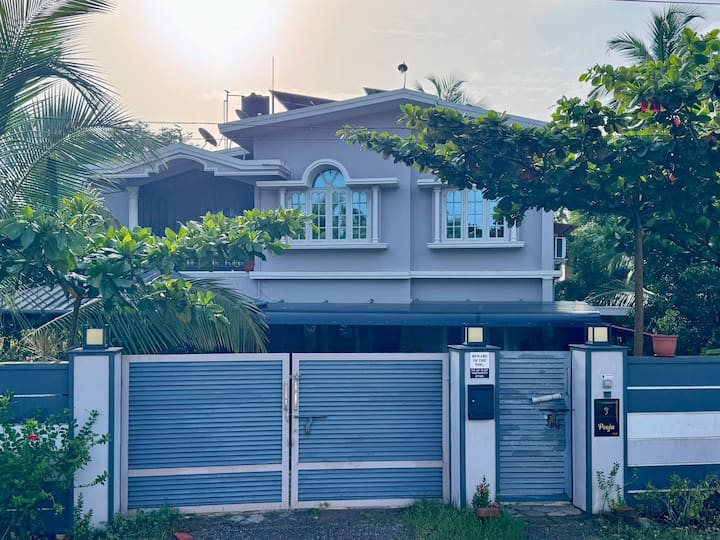 Pooja Coastal Haven - Thalassery