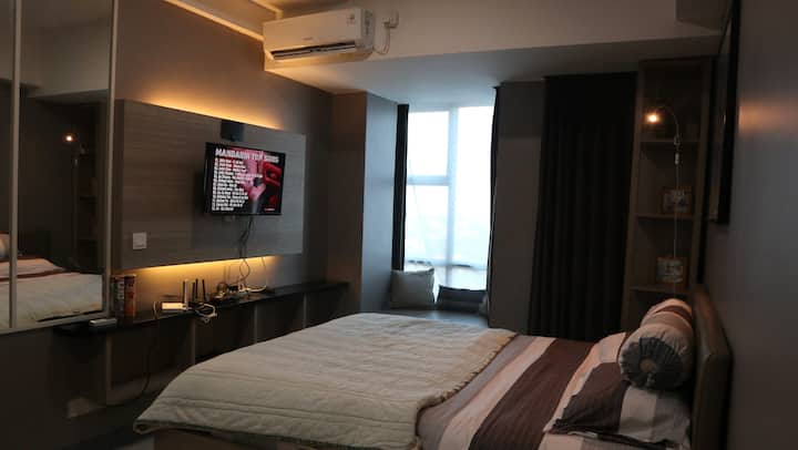 Studio 16 @Anderson Wifi + Netflix + Sliding Bed - Surabaya