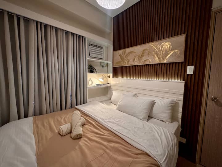 Blissful Abode 2-br Suite | Washer | Living Room - Quezon City