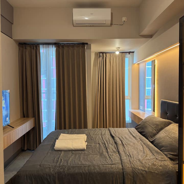 Studio Bella Pakuwoncity Mall Cozy New Apartment22 - Surabaya