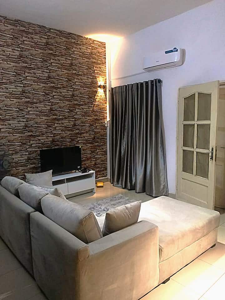 Cozy Nook : Retraite Confortable D'une Chambre - Cotonou