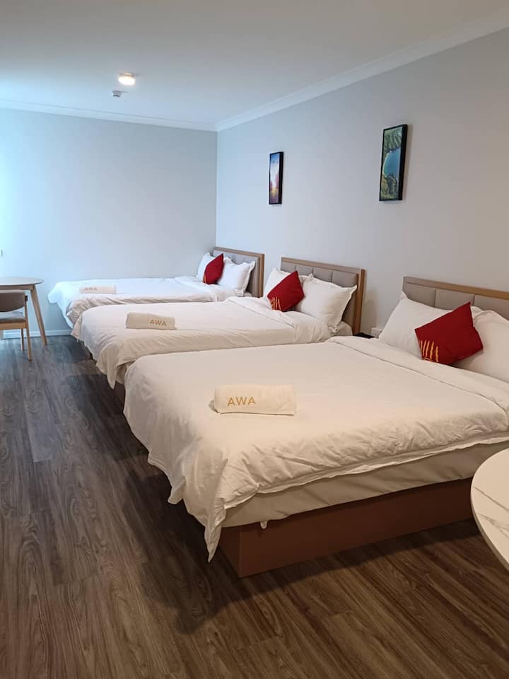 A Room With 3 Double Beds In Awa Hotel (4-star) - Rotorua