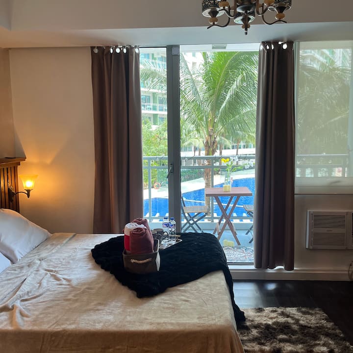 Condo Azure Parañaque: Cozy Fireplace & Pool View - Taguig