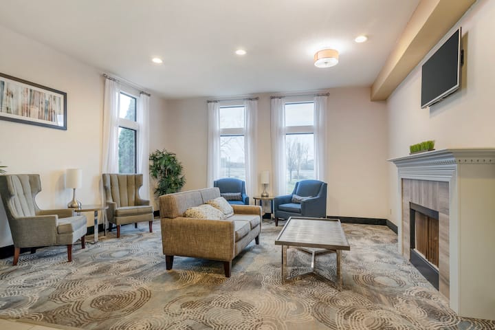 King Bedroom With Refrigerator And Sofa Bed - Syracuse, NY