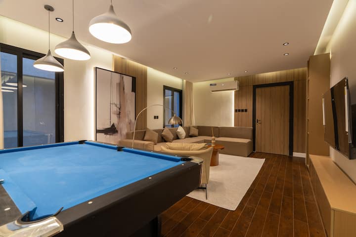 شقة أنيقة بغرفتين وصالة وبلياردو بجانب البوليفارد - Saudi Arabia
