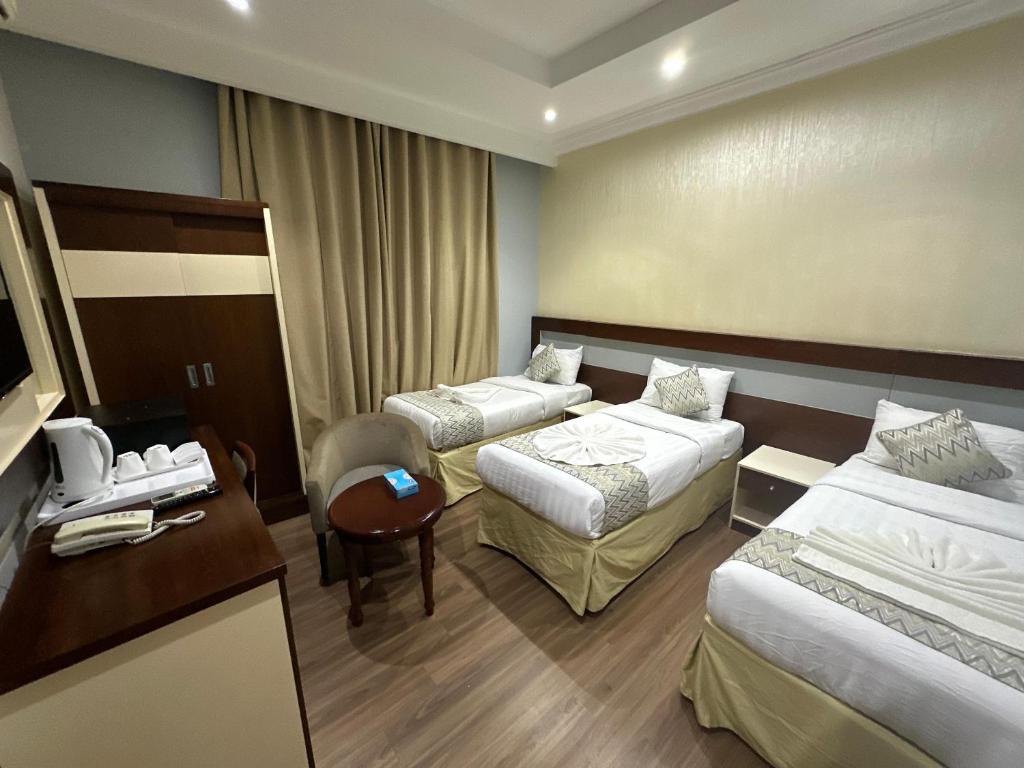 Chambre privée avec 5 lits - Hôtel Zad Al Rehab - Bus gratuit - Hôtels ...