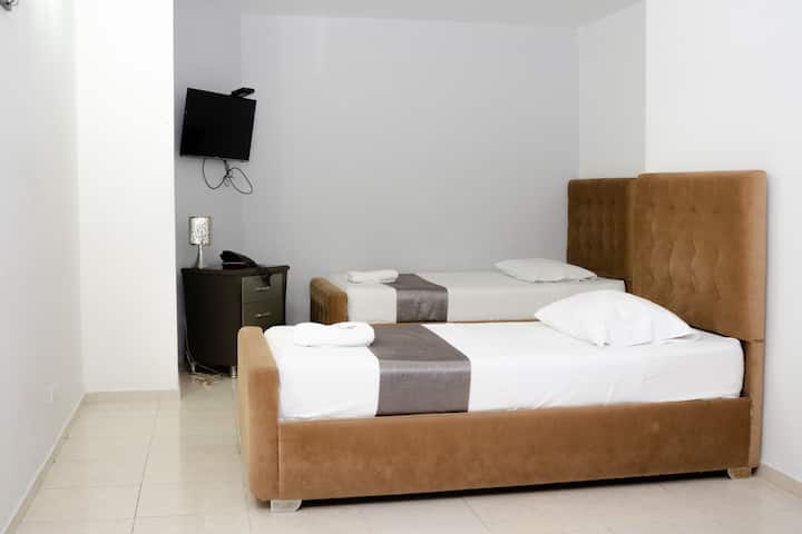 Habitación Suite Familiar - Cali