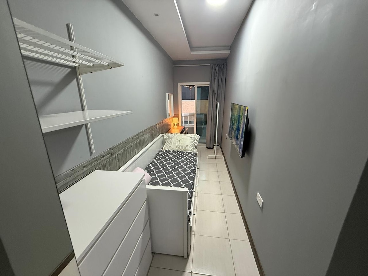 A Comfy Small Partition Room + Balcony on Corniche - Flats for Rent in ...