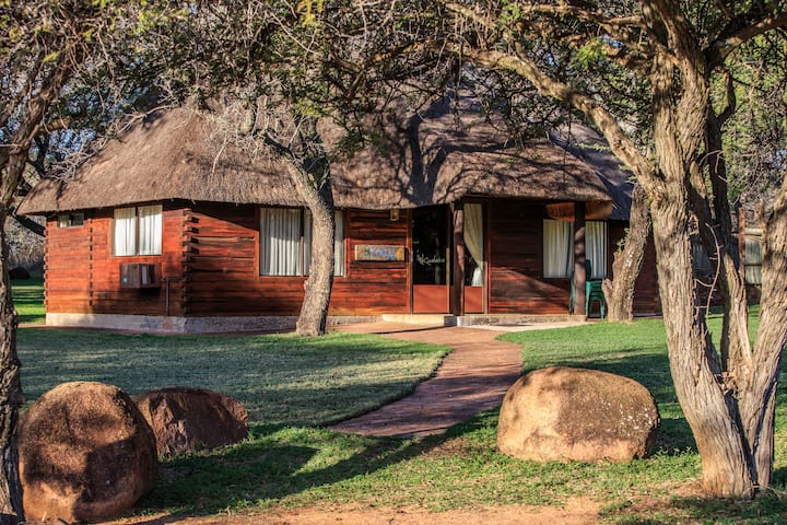 Family Log & Thatch Cabin - Hammanskraal