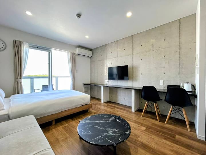 スタジオアパートメント（ダブルベッド＋ソファベッド1台／キッチン付／最大3名) - 沖縄県