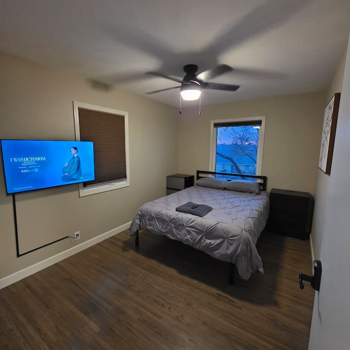 Generous Queen Bedroom—views & Location | Staywise - Omaha, NE