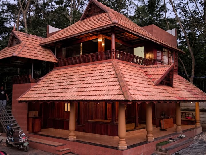 Traditional 
Near World Tallest Siva Linga Temple - Neyyattinkara