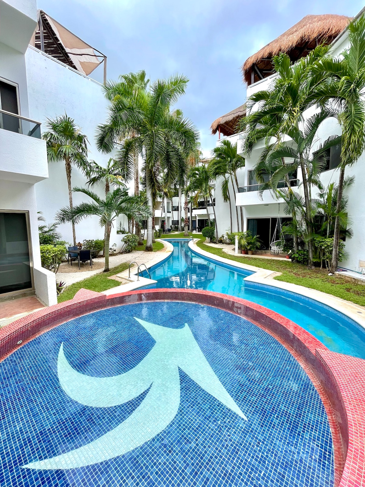 Acceso al club de playa de lujo Big Home Playacar - Departamentos en ...