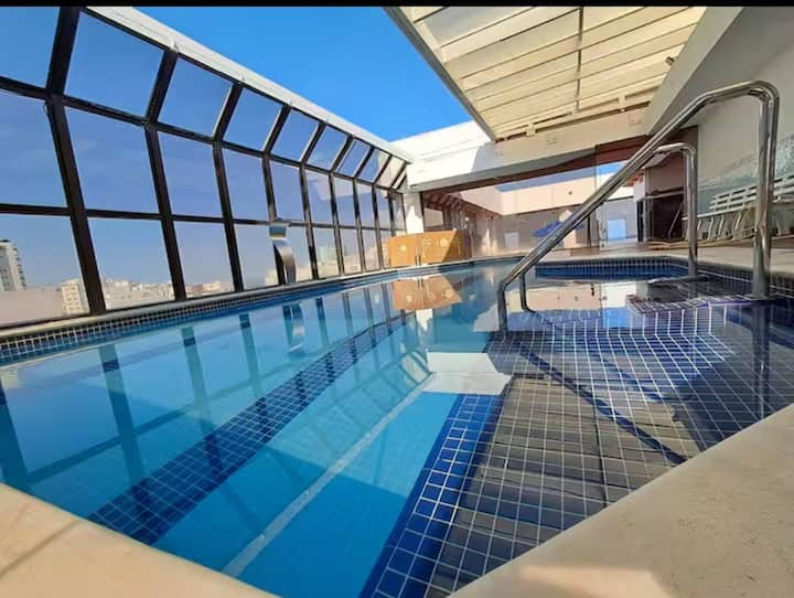 Apto Com A/c Piscina Aquecida Pitangueiras Guarujá - Guarujá