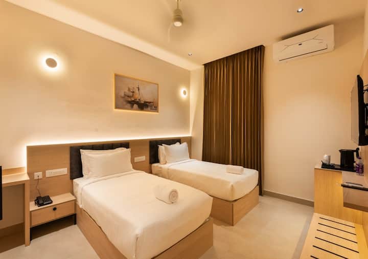 Standard Room Only At The Continental Suites - Kozhikode