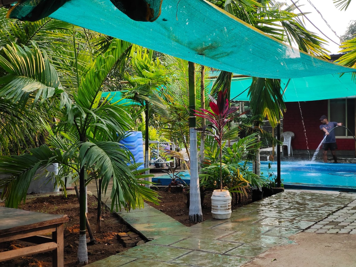Habitaciones con aire acondicionado en casa del árbol Alibaug con ...
