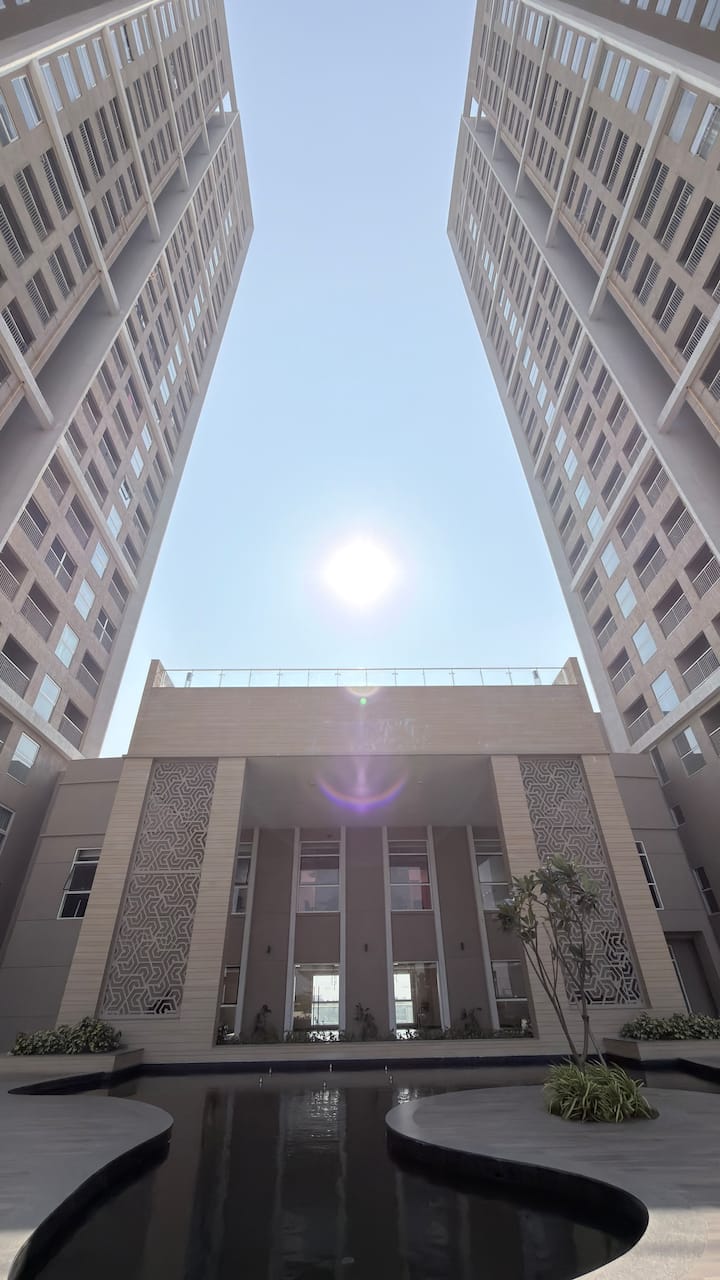 Skyline Haven Spacious 2bhk Higher Floor + Pool - Ahmedabad