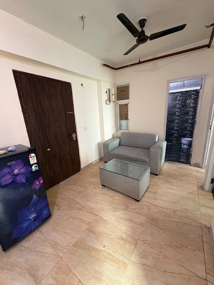 The Cozy Cove | 1bhk | Projector View - Modinagar