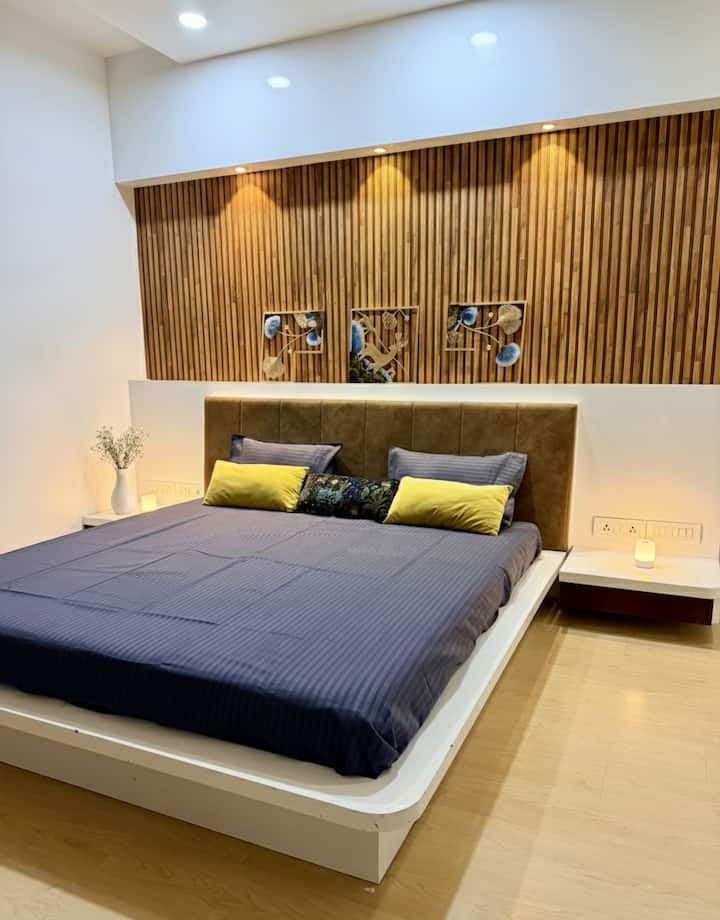 Designer Suite: Chic Wood Accents & Netflix Ready - Ahmedabad