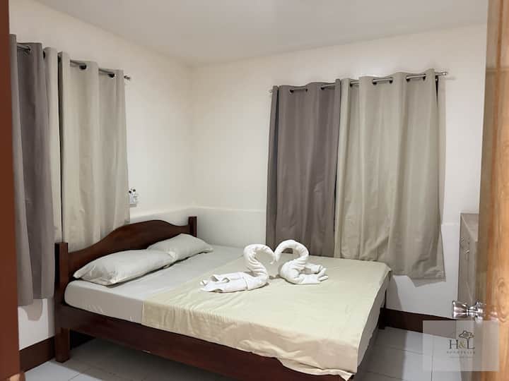 Cozy Apartelle W/ Ac, Kitchen & Island Tours | H&l - Larena