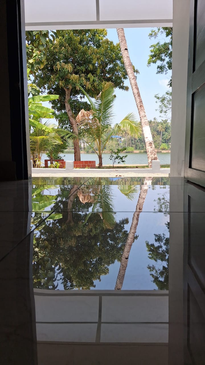 The J House
Peaceful Home In Ashtamudi Lake Front - Kollam