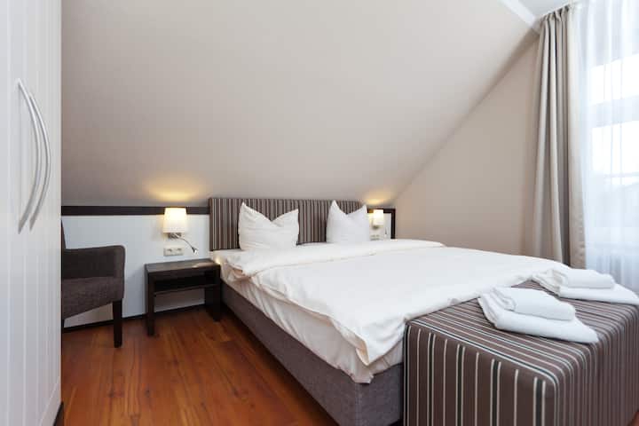 Strandhotel Küstenklang - Familienzimmer 5 Person - Bensersiel