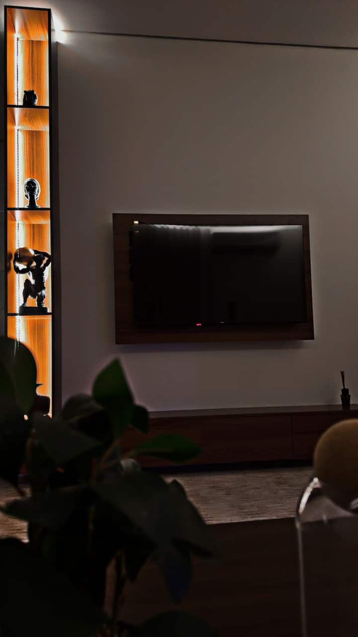 غرفة وصالة بألوان دافئة By Aram Residence - Saudi Arabia